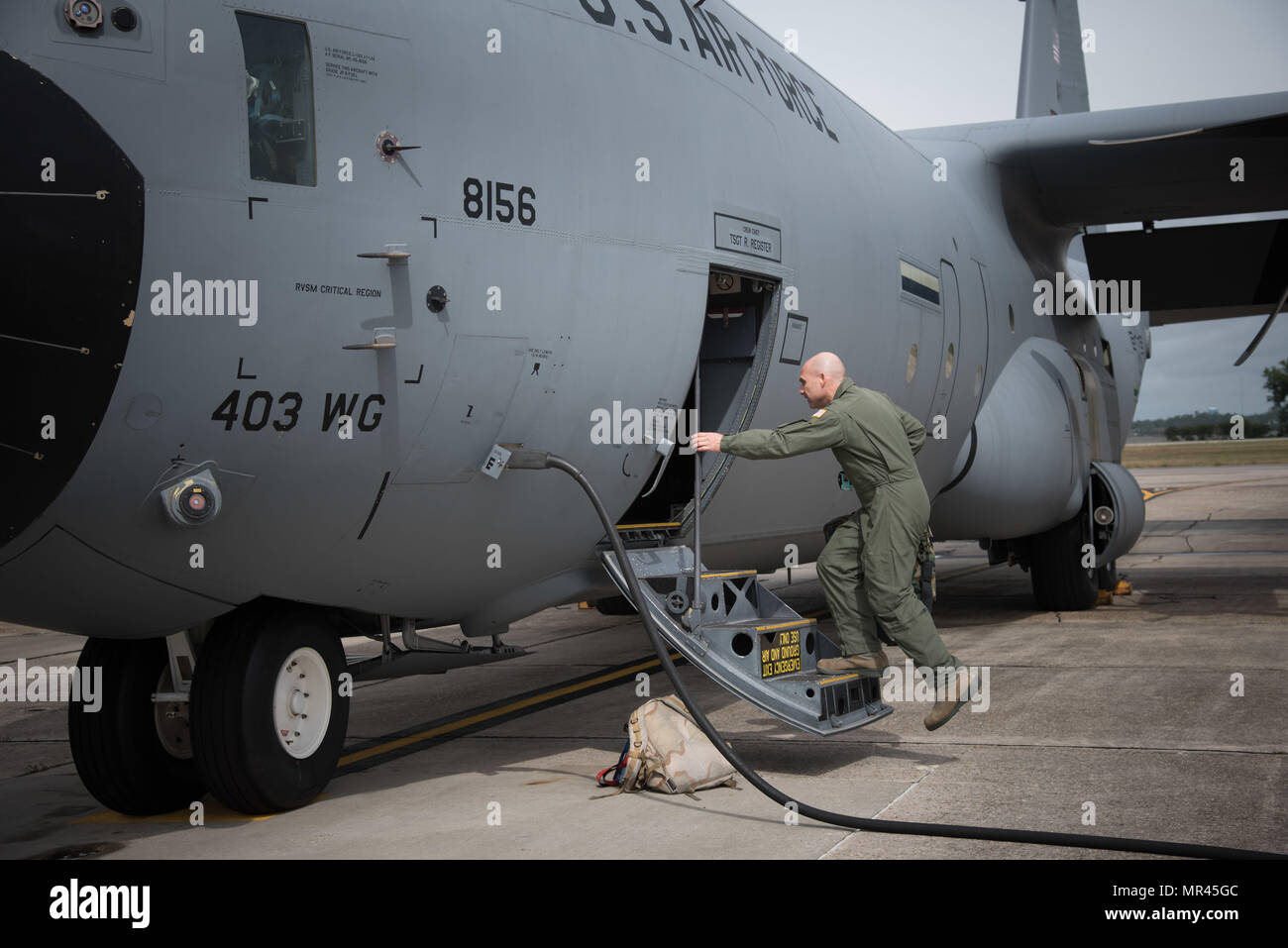 Col. Michael Manion boards a C-130J Super Hercules aircraft before his ...