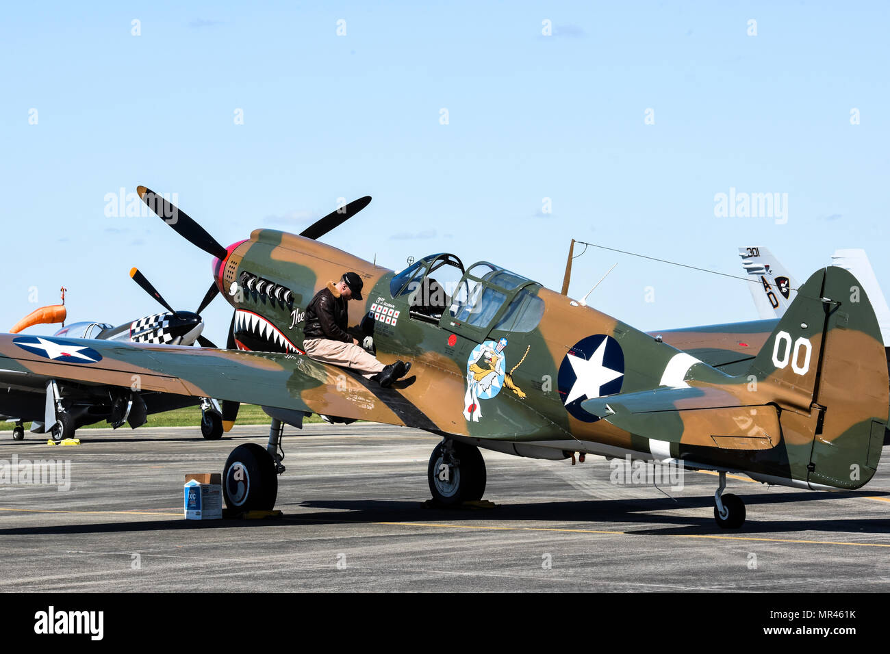 Thom Richard, Cockpit USA pilot, performs pre-flight checks on his ...