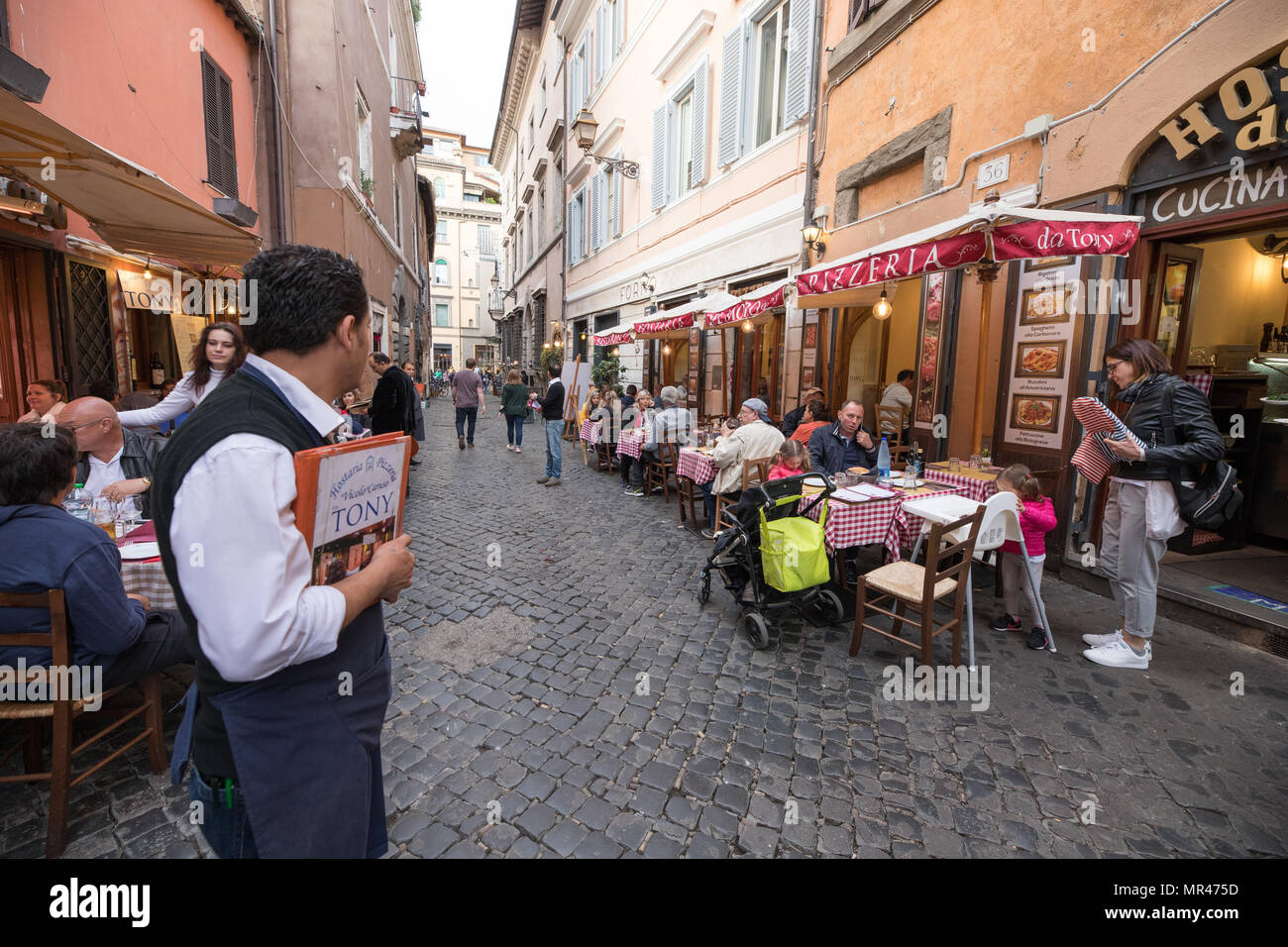 Rome Trastevere restaurant in street, tourists sitting Italy Stock ...