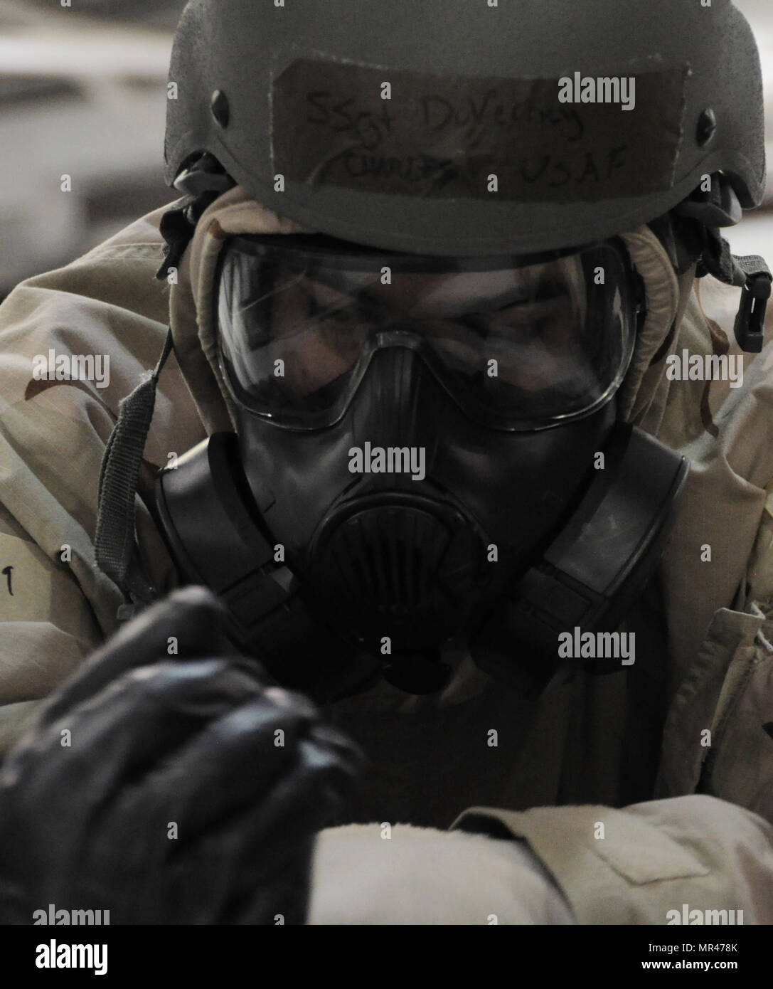 Staff Sgt. Charles Duverney, 442d Aircraft Maintenance Squdron, dons ...