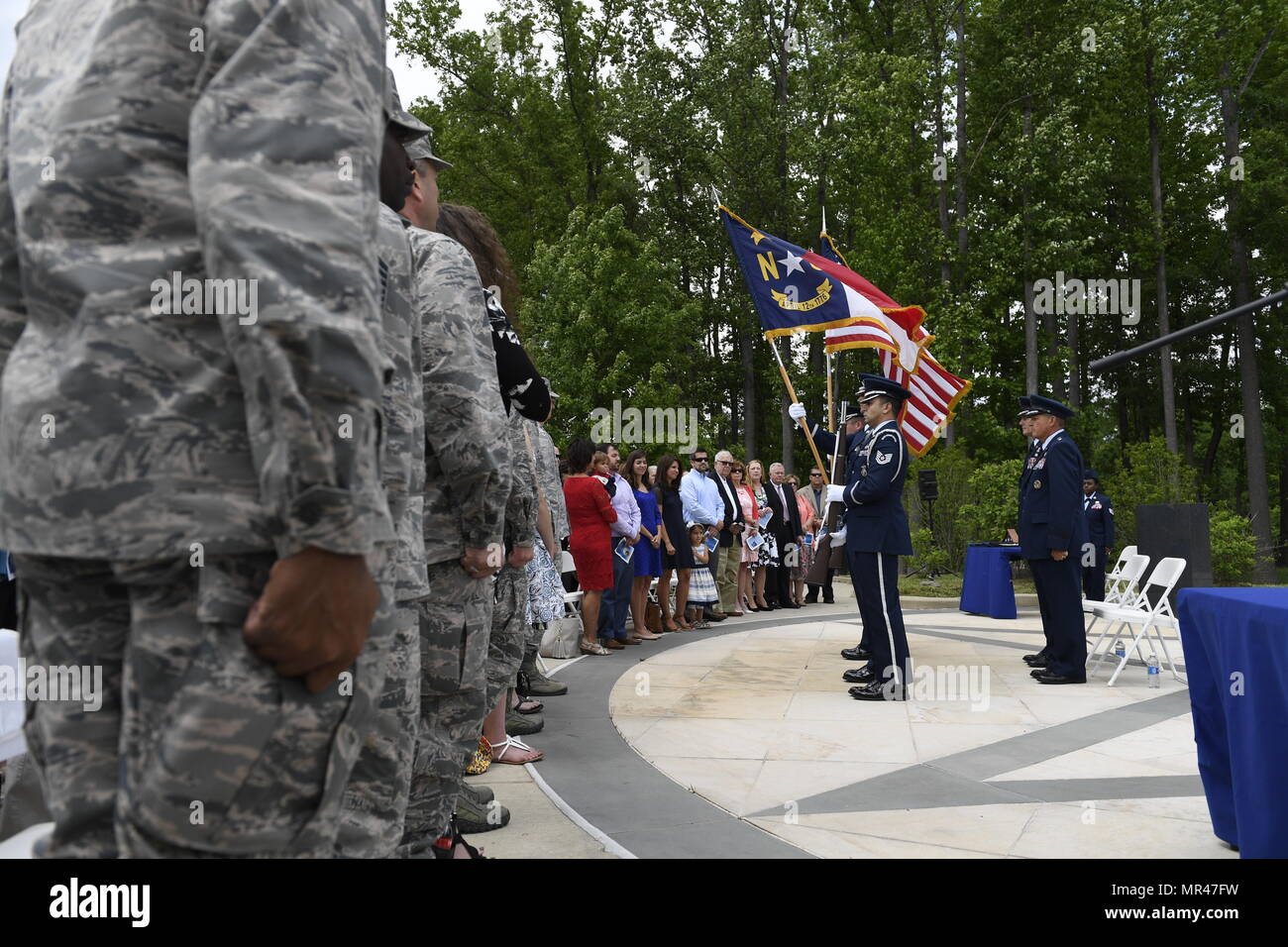 U.S. Air Force Airmen, friends, and family attending the retirement of ...