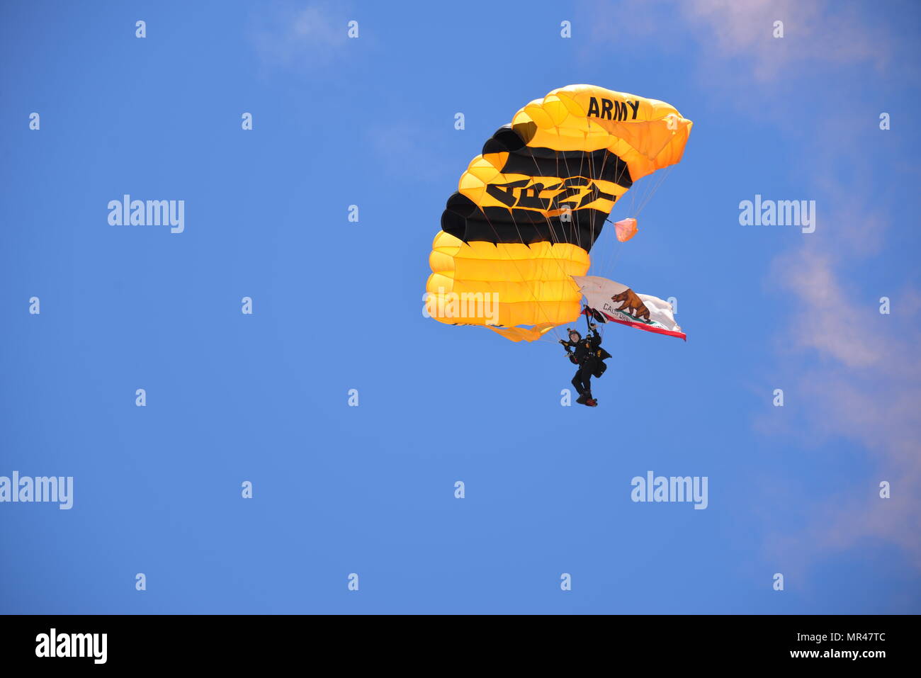 The U.S. Army Golden Knights parachute team perform skydiving maneuvers ...