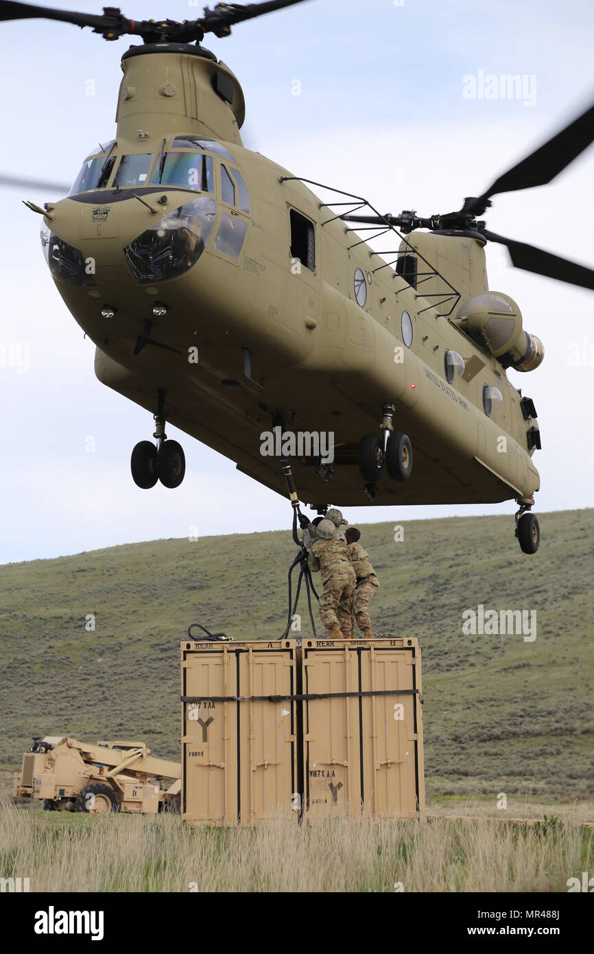 U.S. Soldiers from 92nd Chemical Company, 33rd Chemical Battalion, 48th Chemical Brigade, hook ...