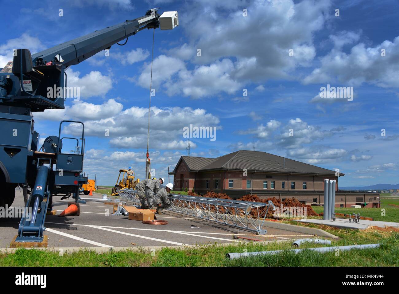 Members of the 241st Engineer Installation Squadron, construct and ...