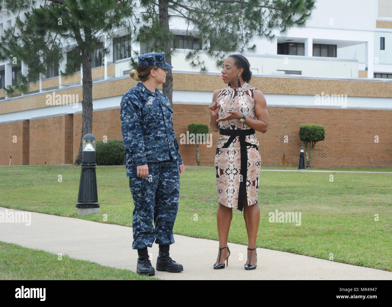 Laticia Jackson, health educator, Naval Hospital Pensacola, talks to a ...