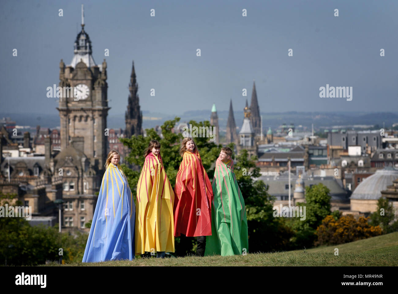 Dressed in giant capes (from left) Sofia Allison, four, Lottie Steel ...