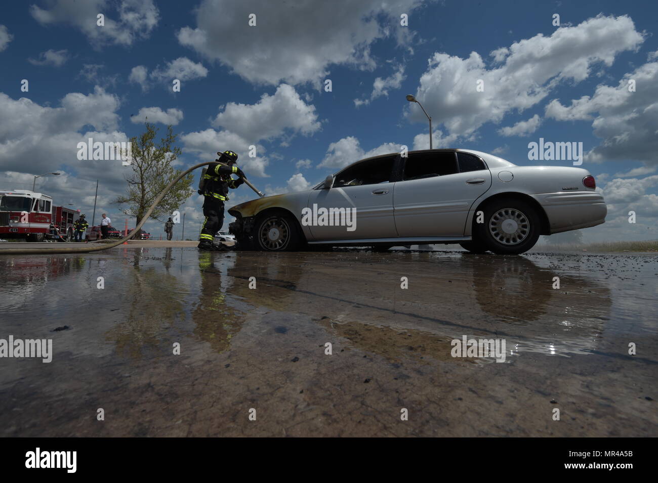 William Green, Tinker Fire and Emergency Services firefighter, sprays ...