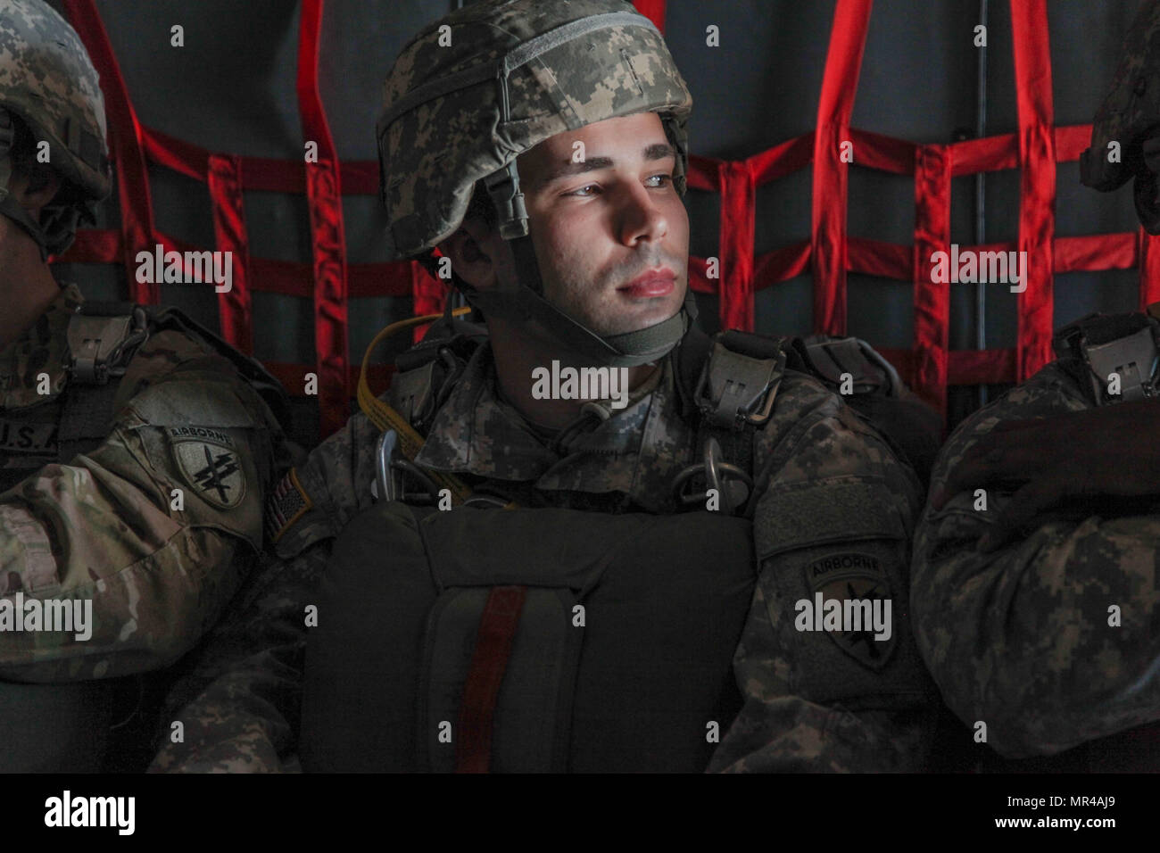 U.S. Army paratrooper of the 310th Psychological Operations Company ...