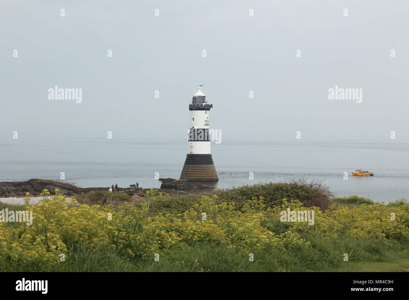 The Penmon Lighthouse at Penmon point, Anglesey, Wales Stock Photo - Alamy