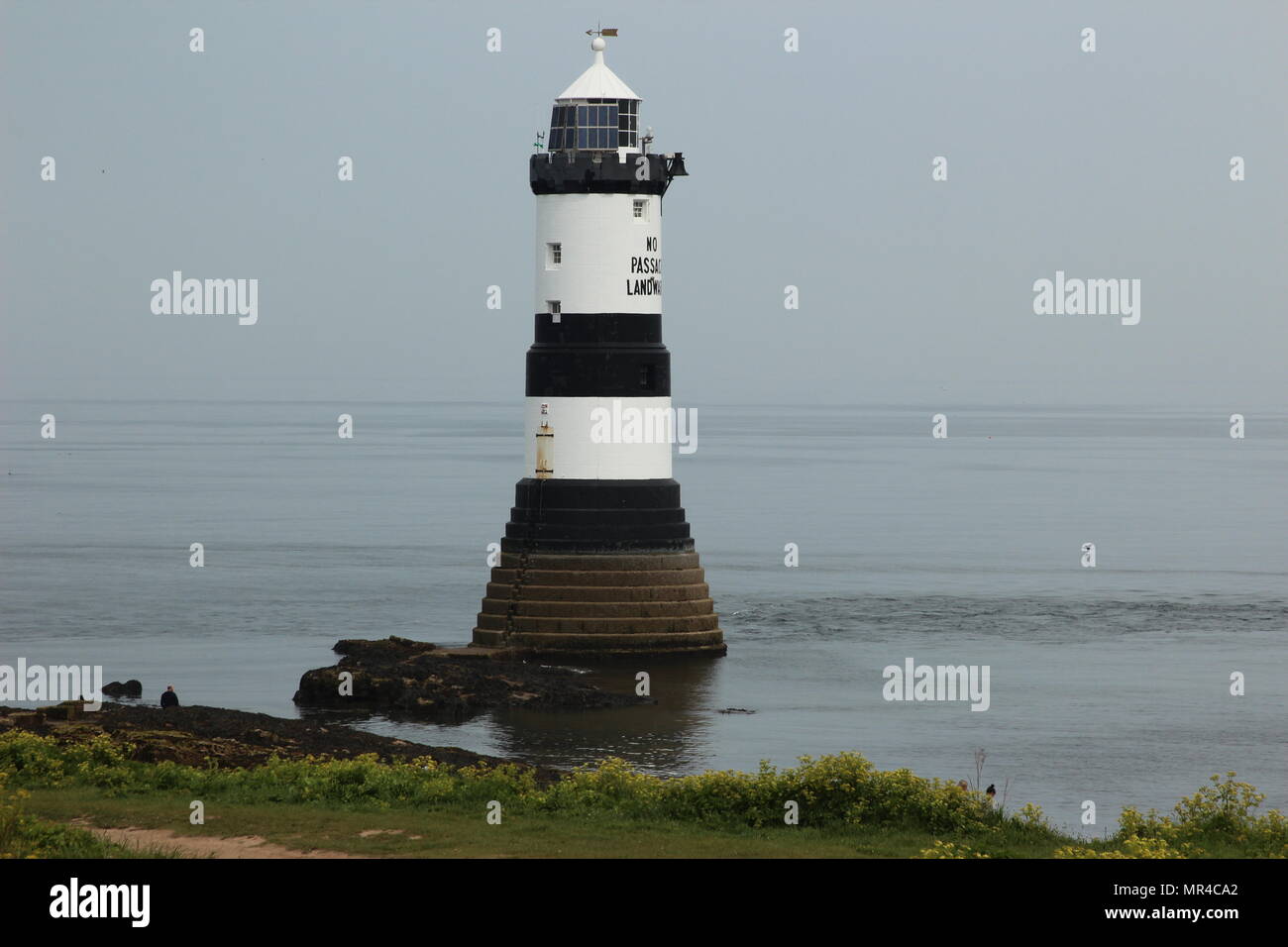 The Penmon Lighthouse at Penmon point, Anglesey, Wales Stock Photo - Alamy