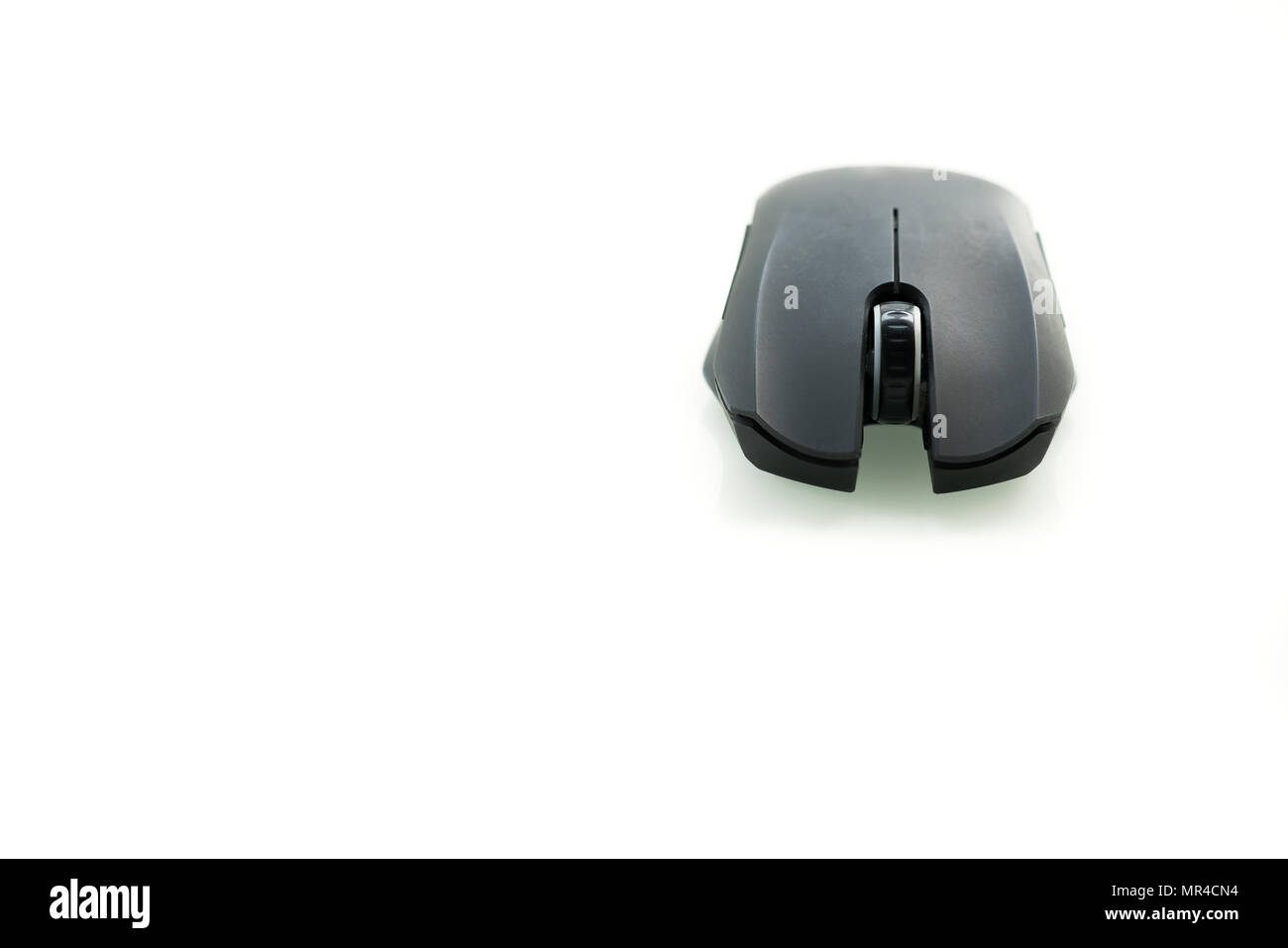 Wireless black computer mouse isolated on white background, frontview ...