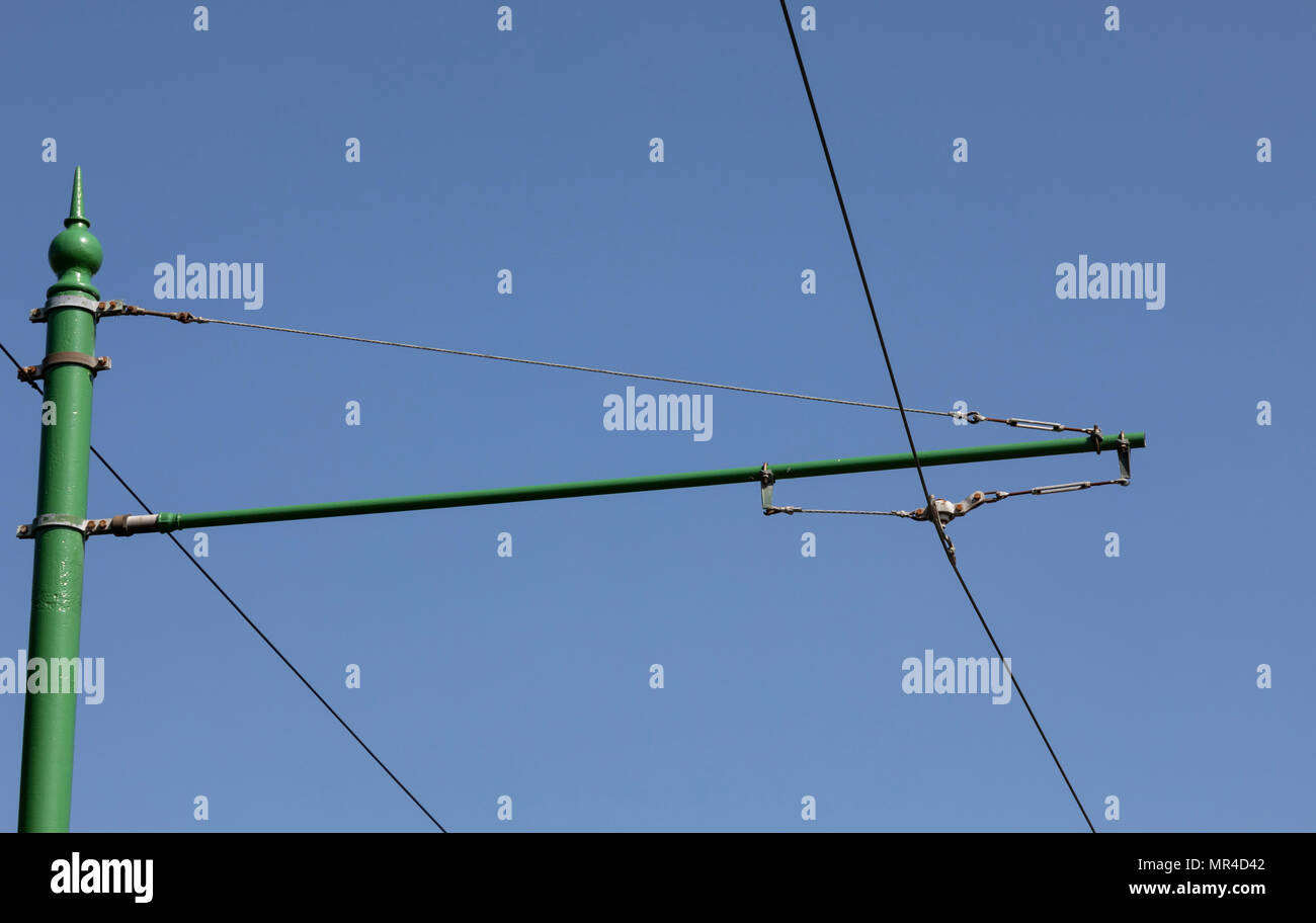 Picture os overhead tram lines mounted on green poles at Woodside ...
