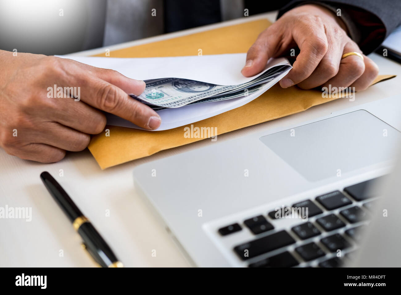 business man counting money at the table, accounting concept Stock ...