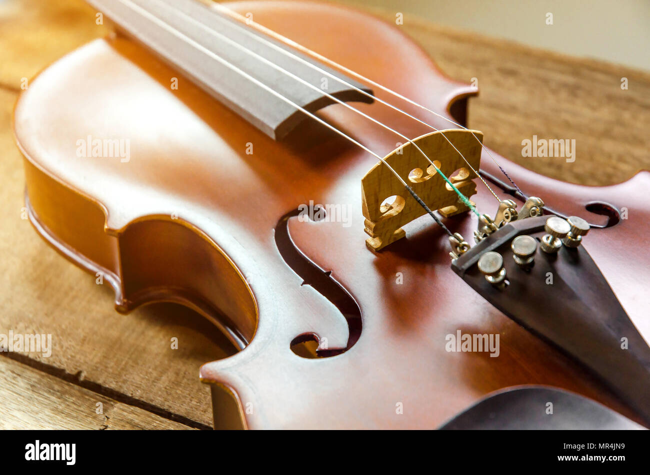 The violin on the table, Close up of violin on the wooden floor, Top ...