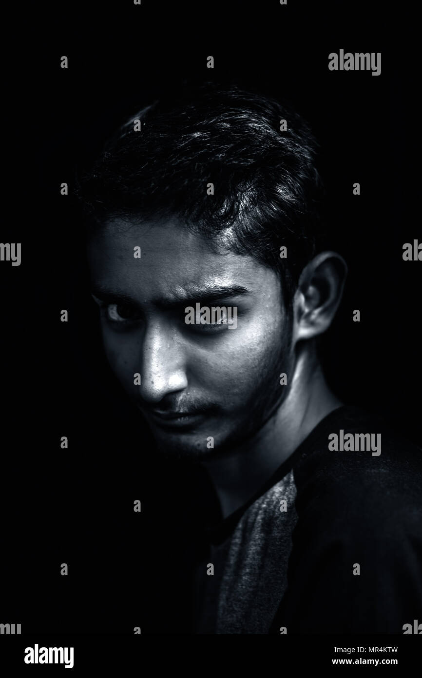 Portrait of a young teenager annoyed or angered on some thing poses in ...