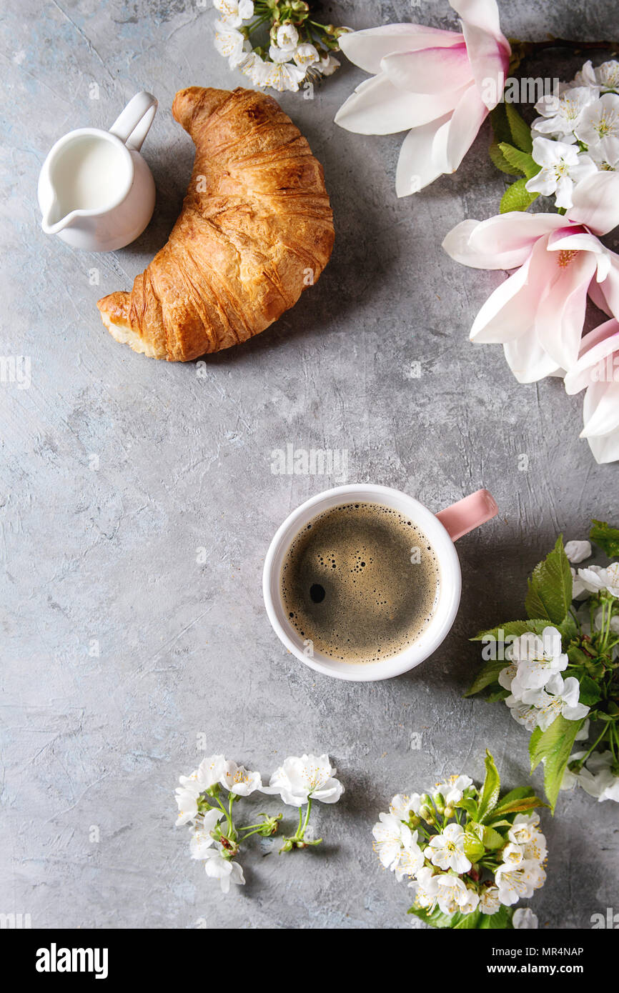 Coffee with spring flowers Stock Photo - Alamy