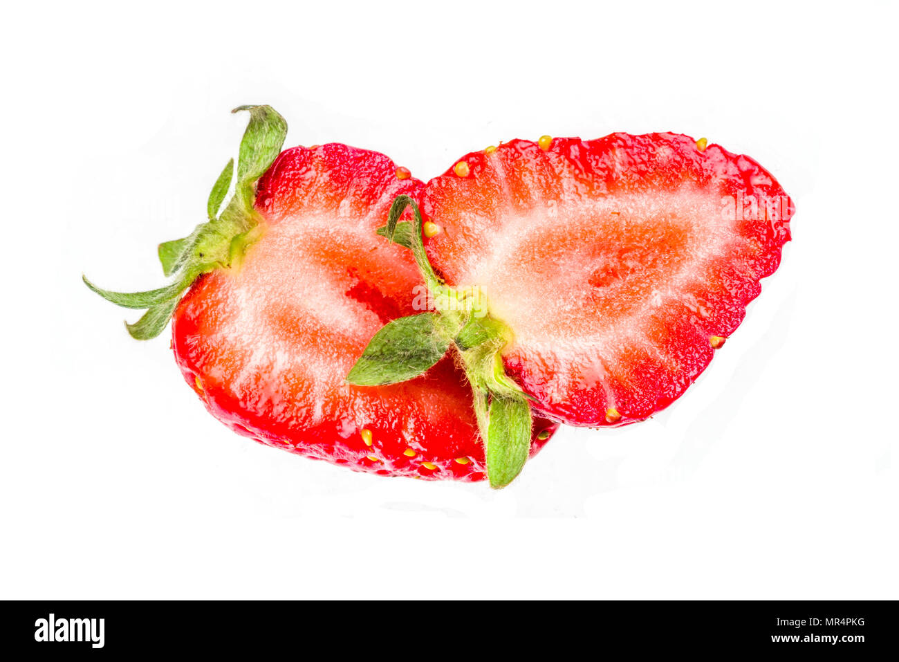 Ripe raw sliced organic strawberry, isolated on white background Stock ...