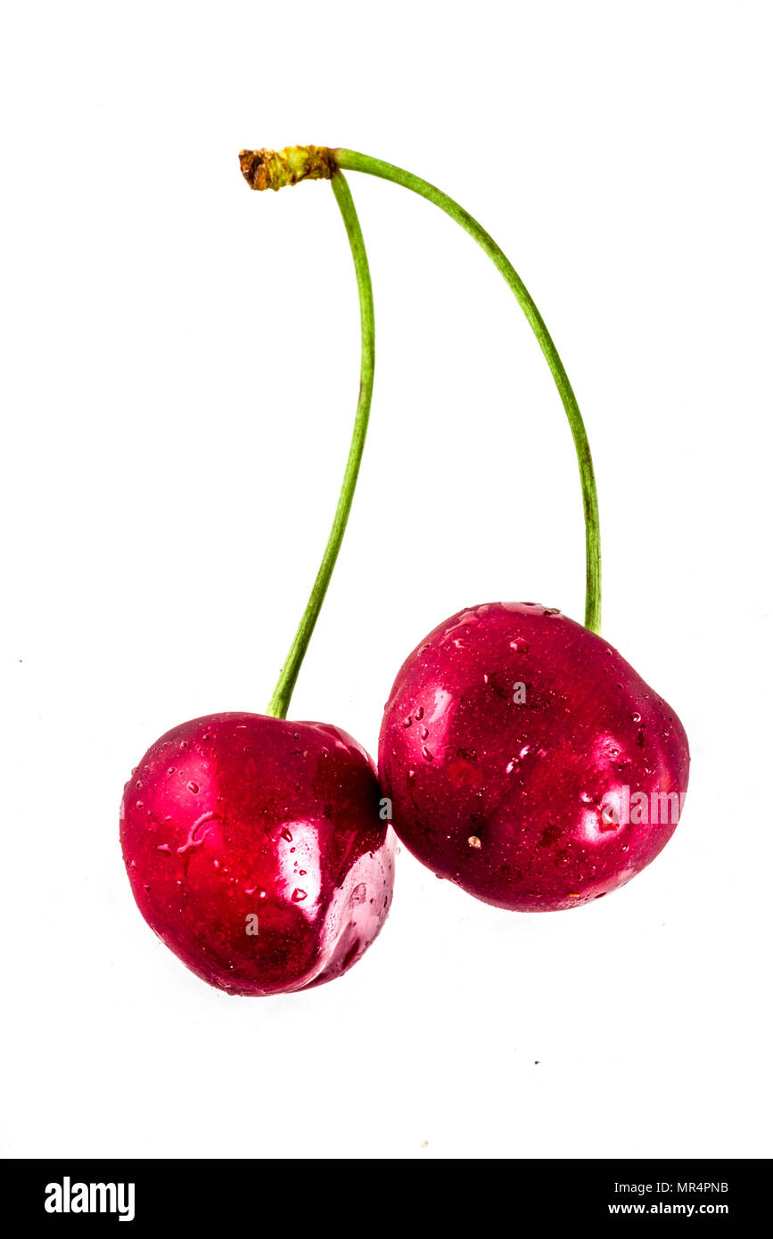 Ripe raw organic cherry, isolated on white background Stock Photo - Alamy