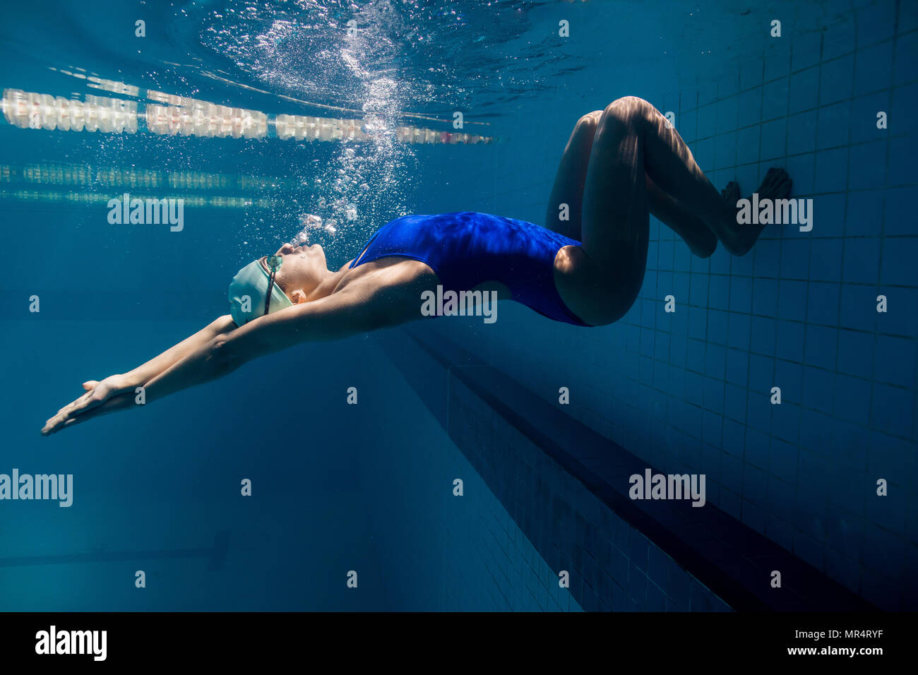 Beautiful Young Woman Swimming Underwater High Resolution Stock ...