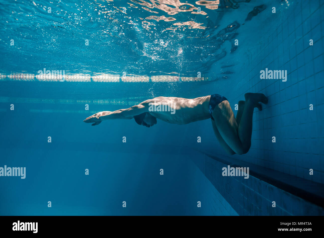 underwater picture of male swimmer swimming i swimming pool Stock Photo ...
