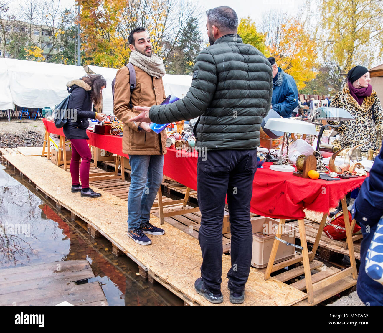 Berlin Prenzlauer Berg. Mauerpark Fleamarket. Rains & poor drainage of ...