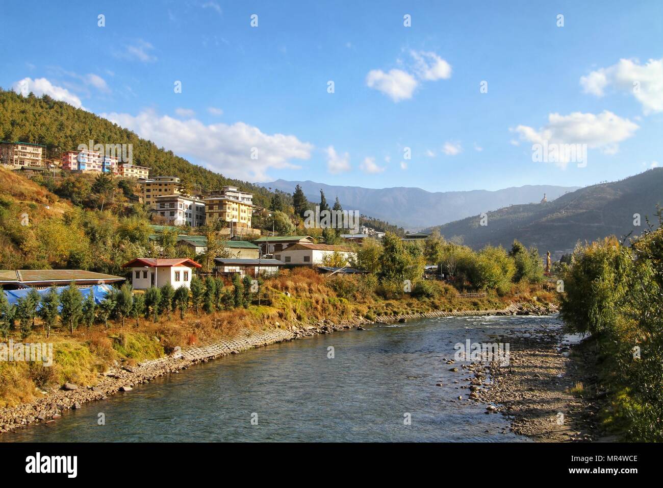 Colorful traditional Bhutanese style building decorated with carved ...