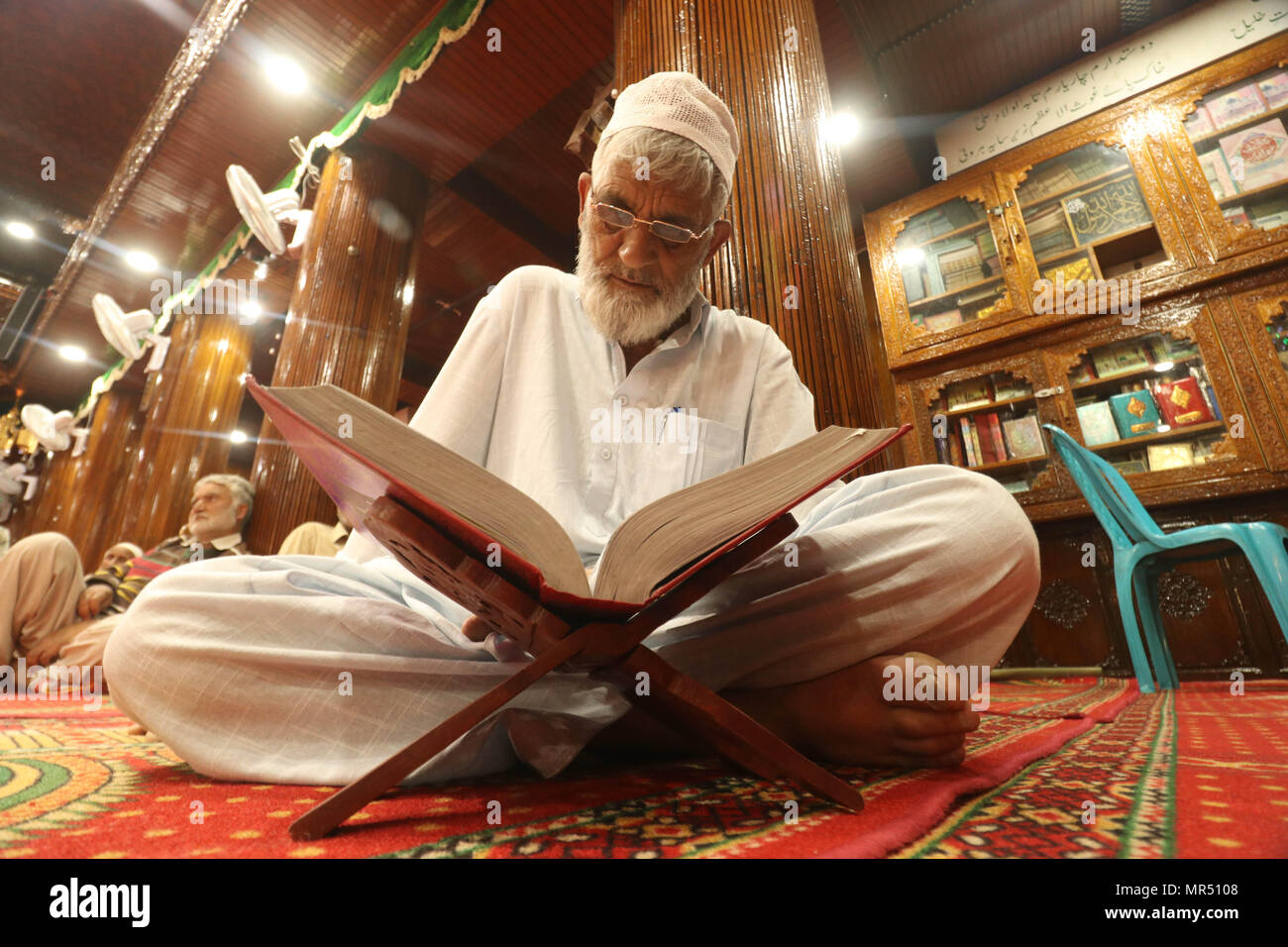 Quran reciting hi-res stock photography and images - Alamy
