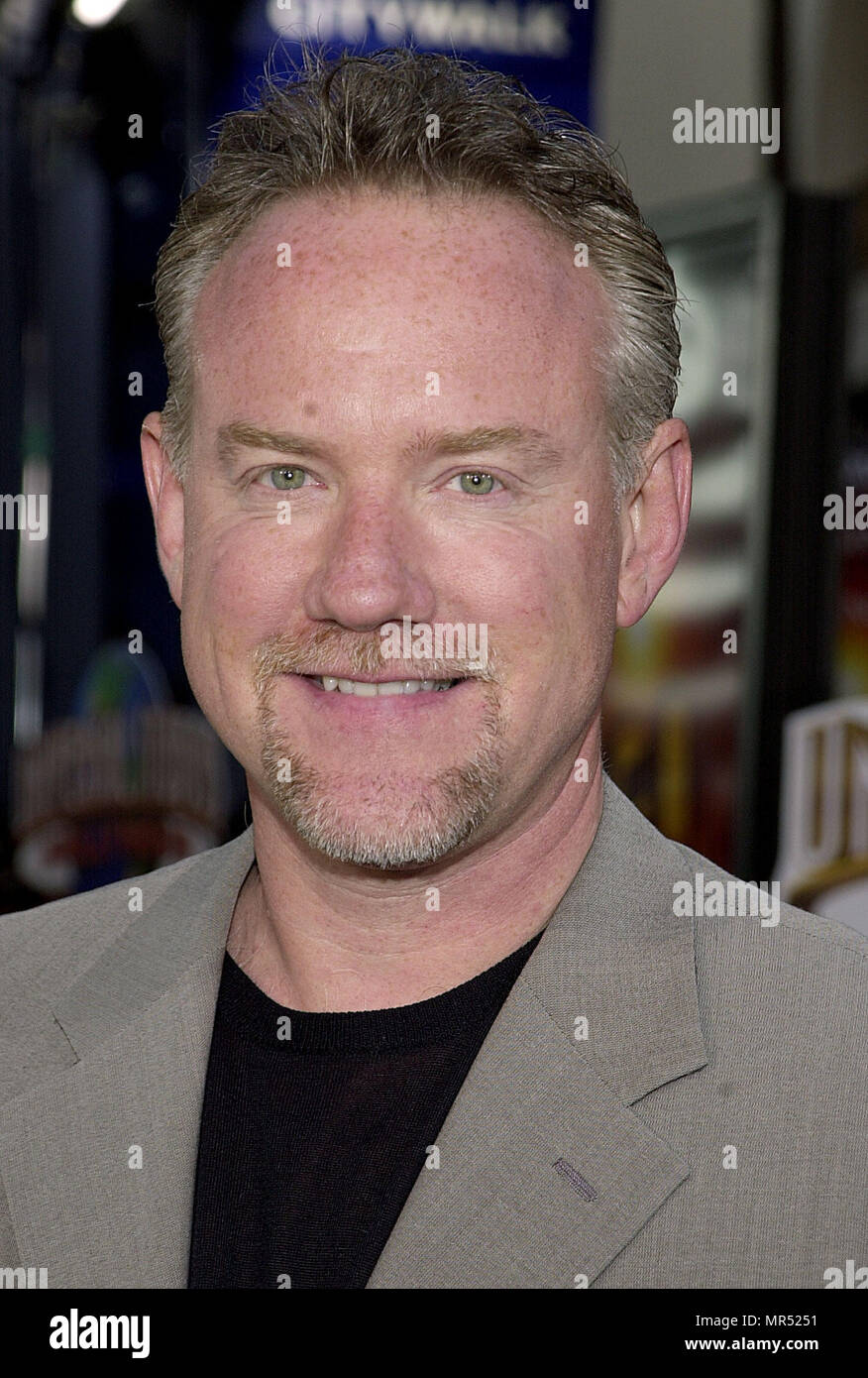 John Debney (composer) arriving at the premiere of Scorpion King at the ...