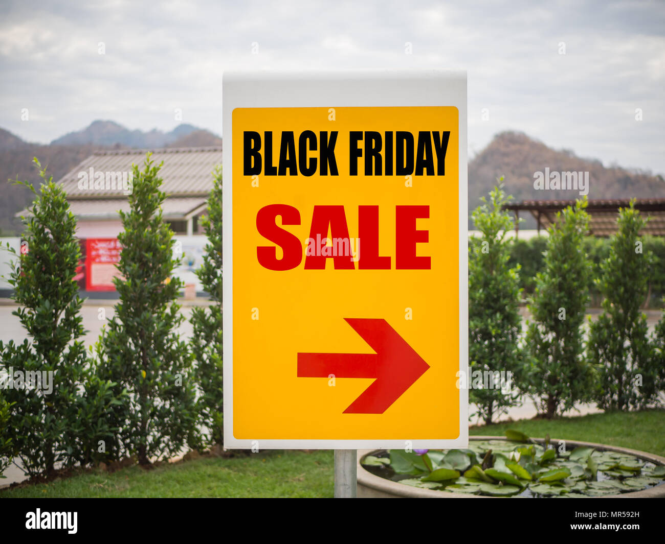 BLACK FRIDAY road sign on yellow background Stock Photo - Alamy