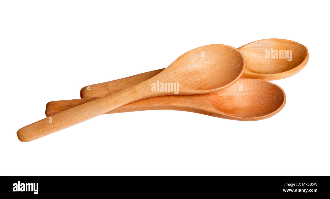 Three small wooden spoons isolated on white. Stacked photo Stock Photo ...