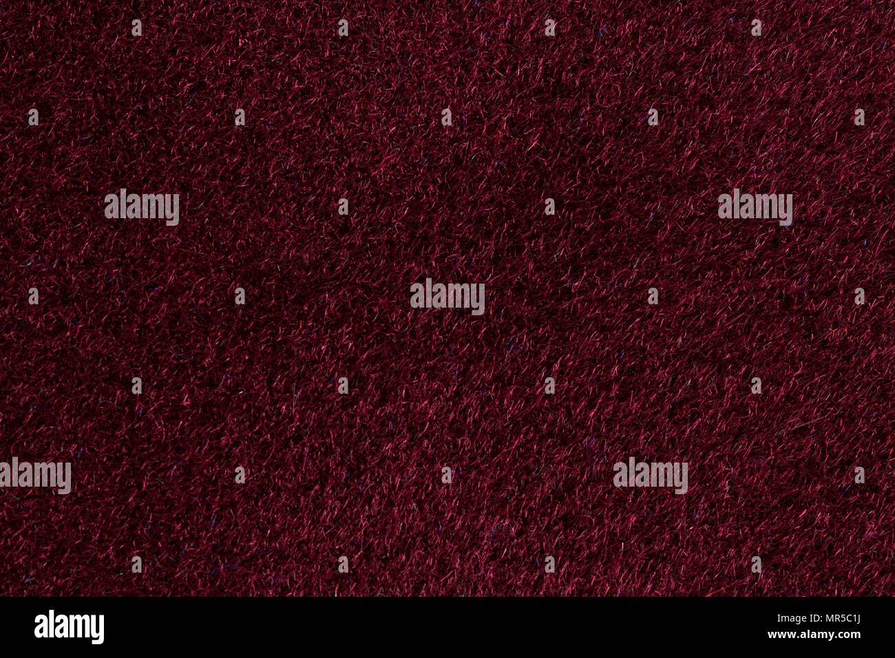 A dark red paper background with mottled grunge patterns Stock Photo ...