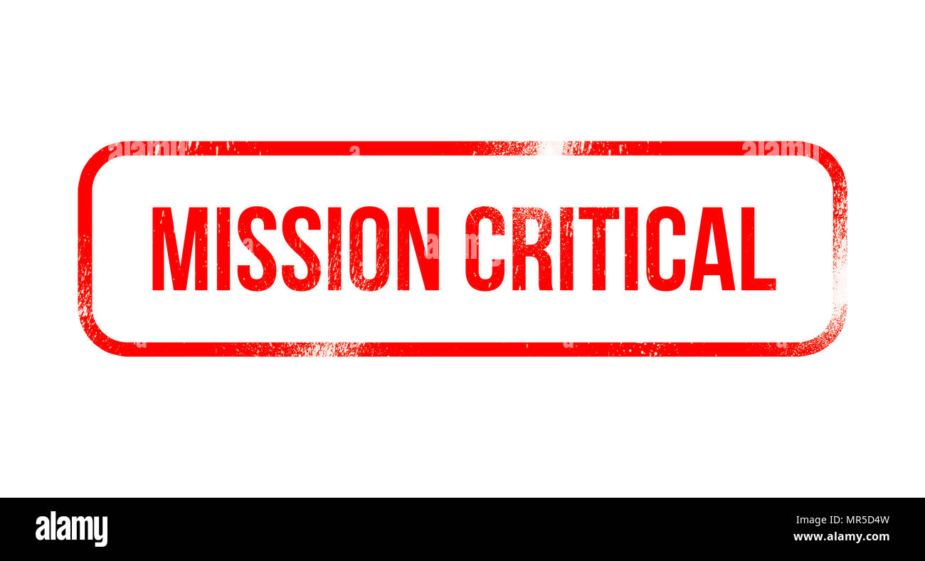 Mission Critical - red grunge rubber, stamp Stock Photo - Alamy