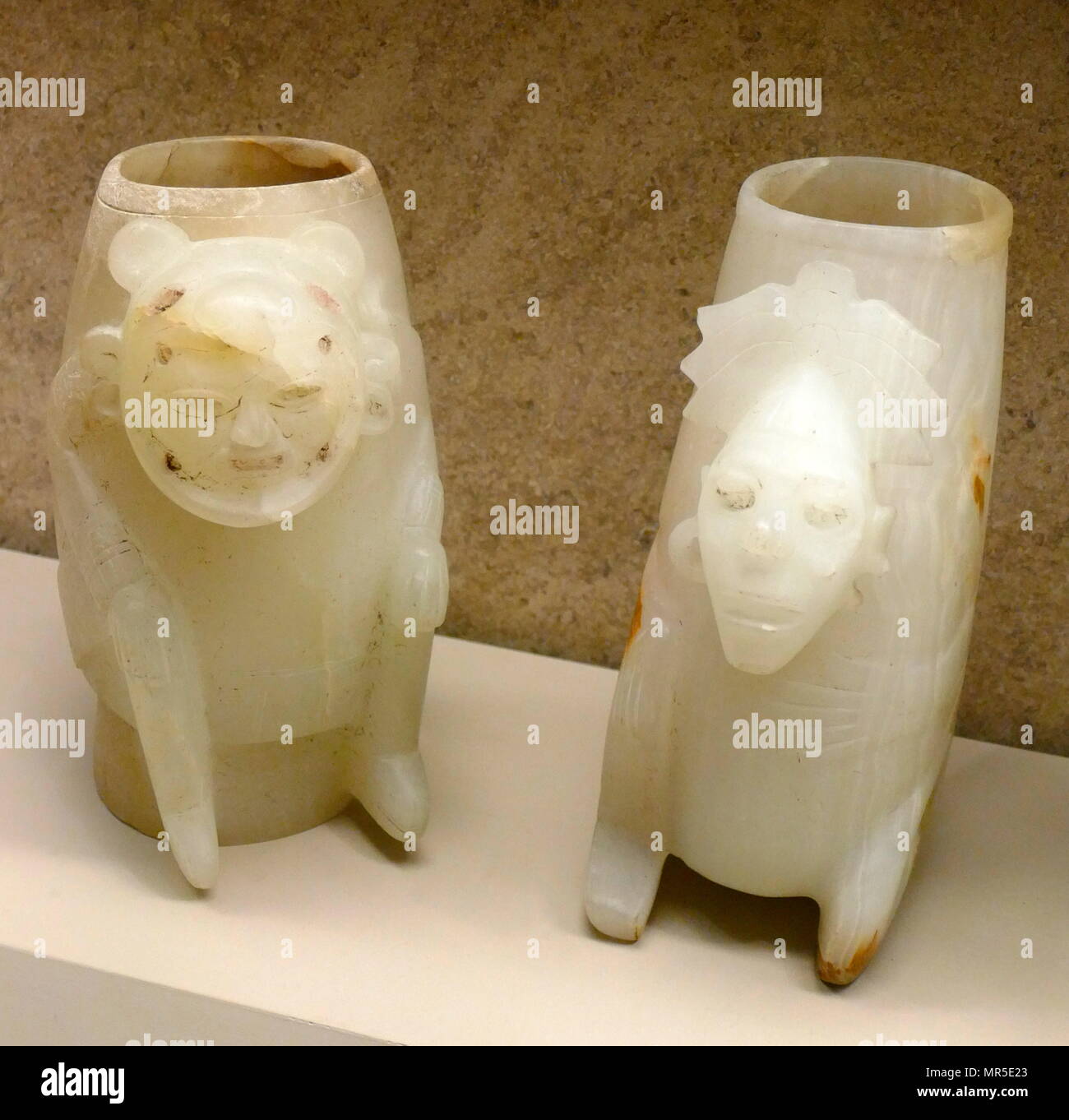 Carved and polished Onyx (tecali) vessel with a seated figure. Post ...