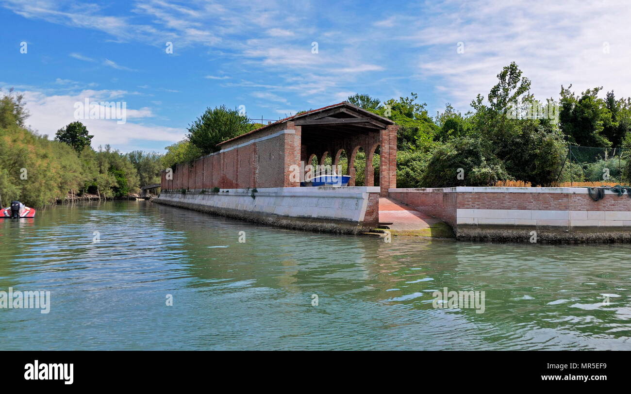 The abandoned Poveglia island, outside Venice, in the Venetian Lagoon ...
