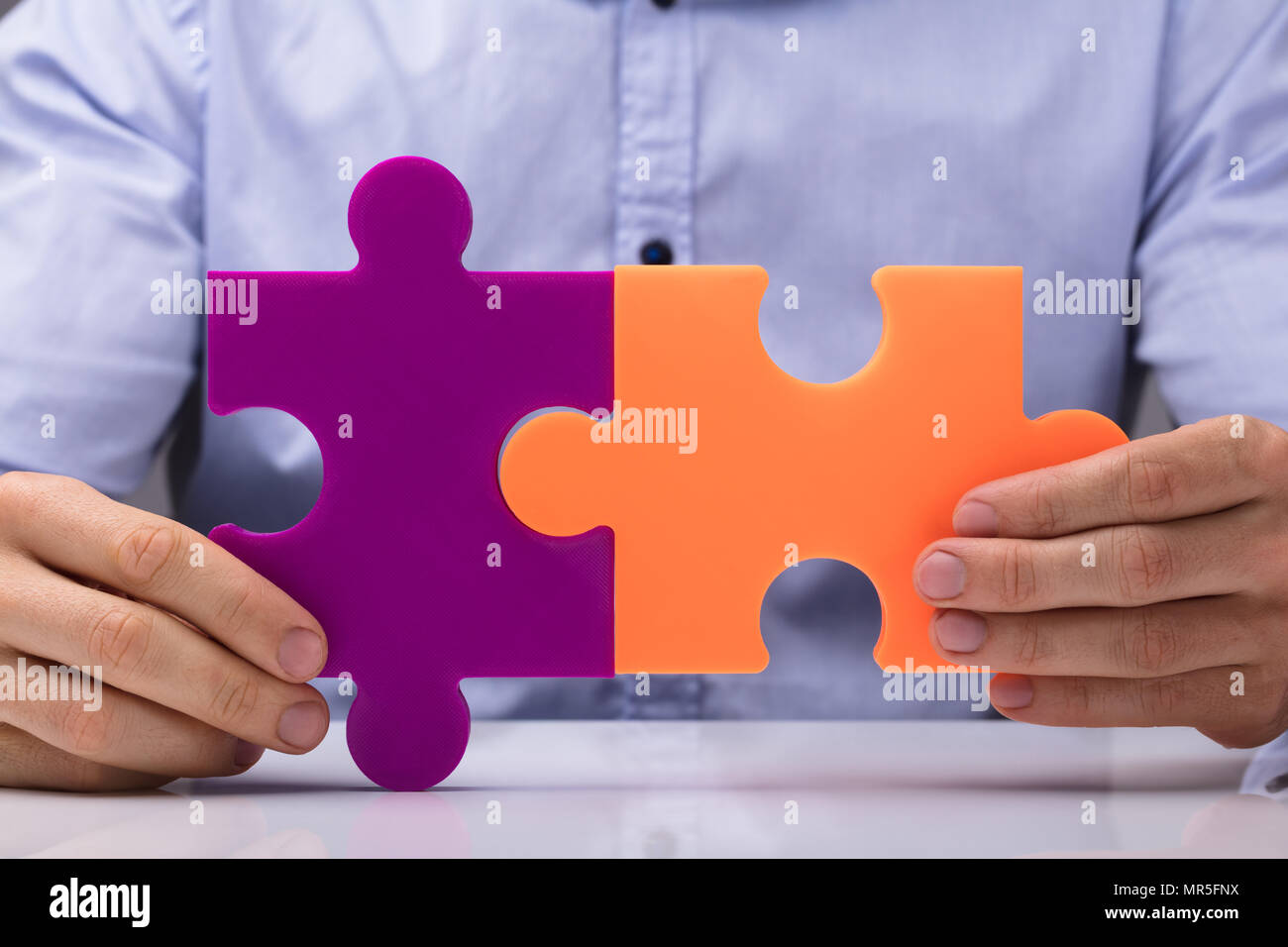 Purple jigsaw puzzle hi-res stock photography and images - Alamy