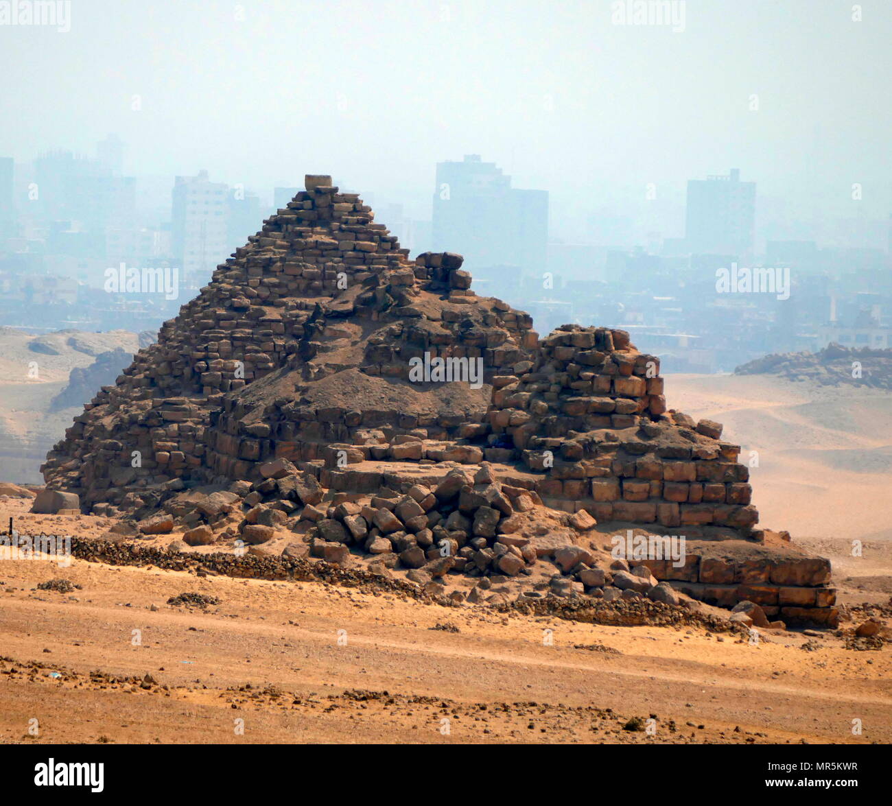 Ruined small pyramids stand near the Pyramid of Menkaure, on the Giza ...