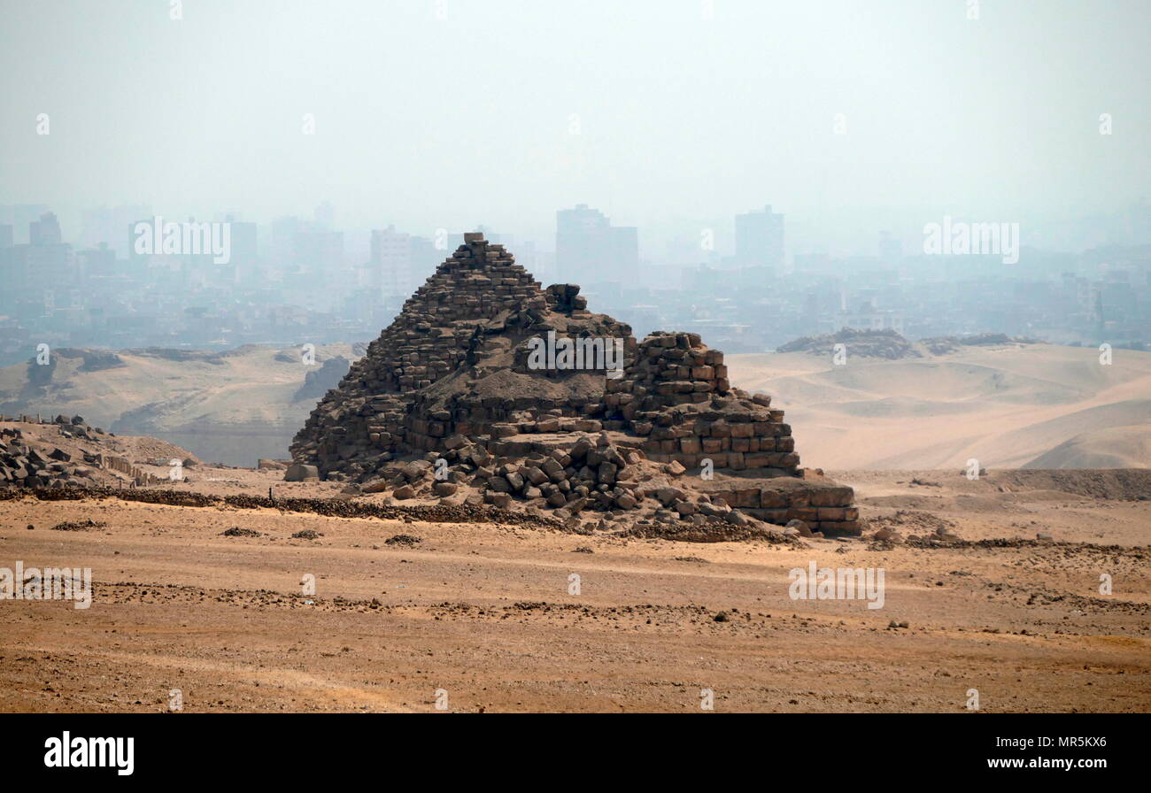 Ruined small pyramids stand near the Pyramid of Menkaure, on the Giza ...