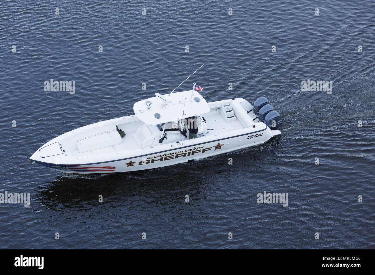 A Hillsborough County Sheriff's boat patrolling Tampa Bay Harbor Stock ...