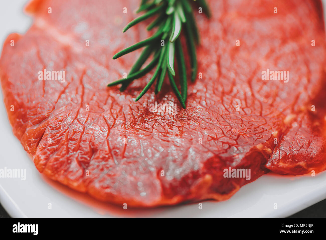 Raw beef cooking with ingredients. Top view with copy space Stock Photo ...