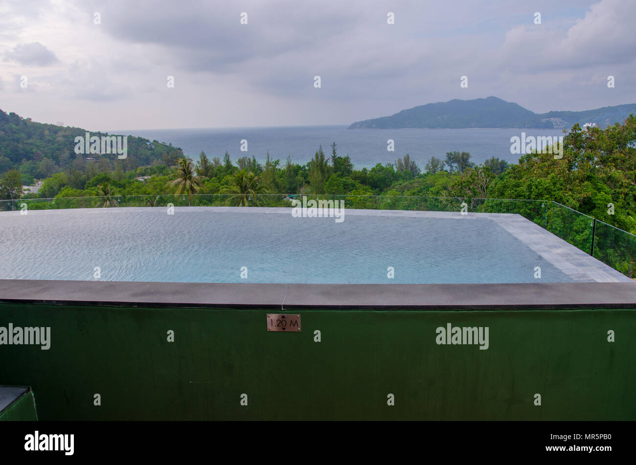 Swimming pool beautiful in tropical resort Stock Photo - Alamy