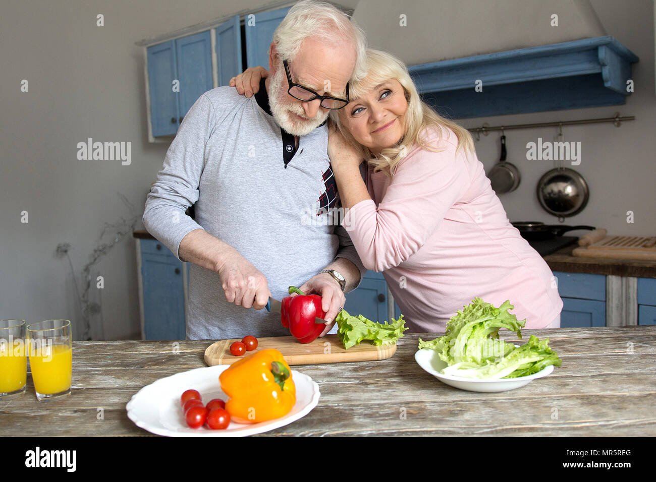 Old couple cooking hi-res stock photography and images - Alamy