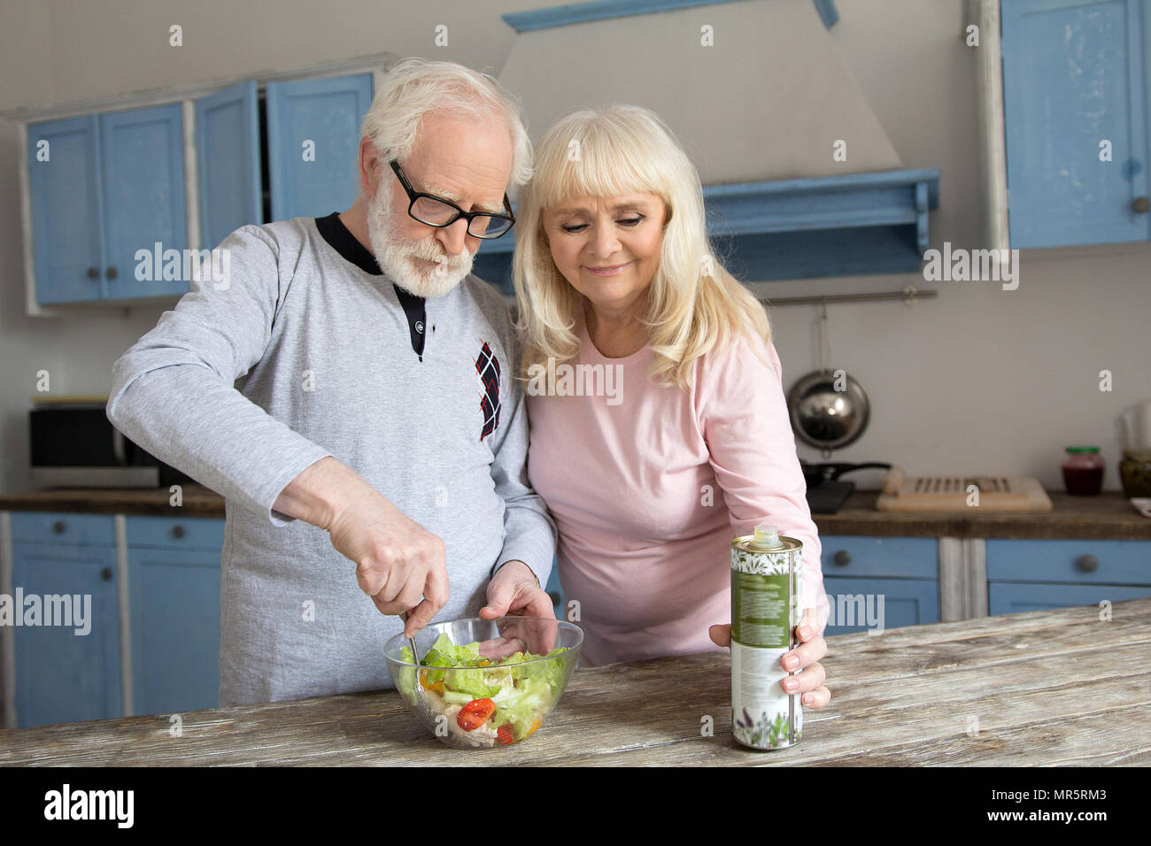 Senior couple cooking together Stock Photo - Alamy