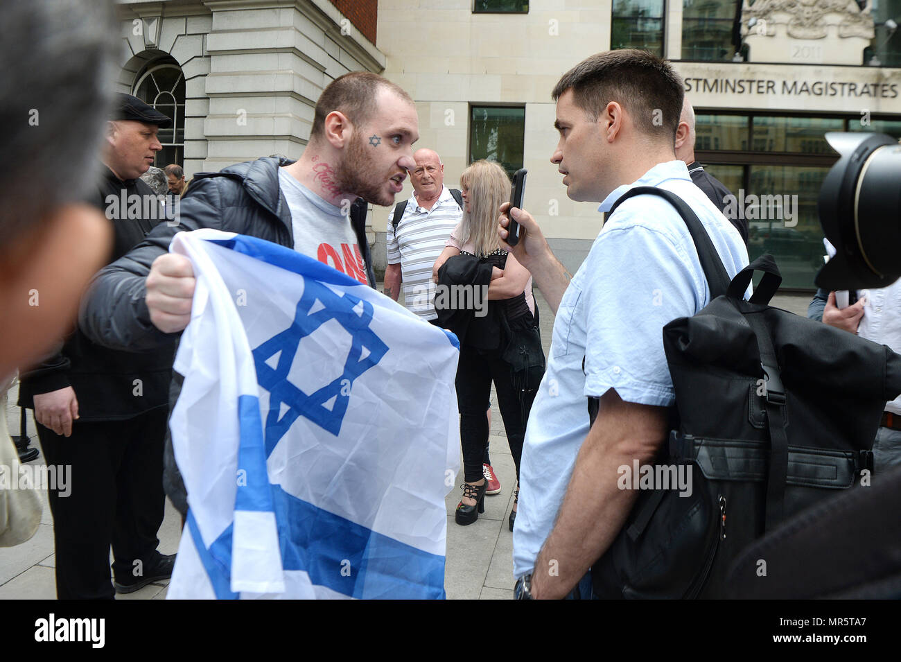 Arguments ensue outside westminster magistrates court hi-res stock ...
