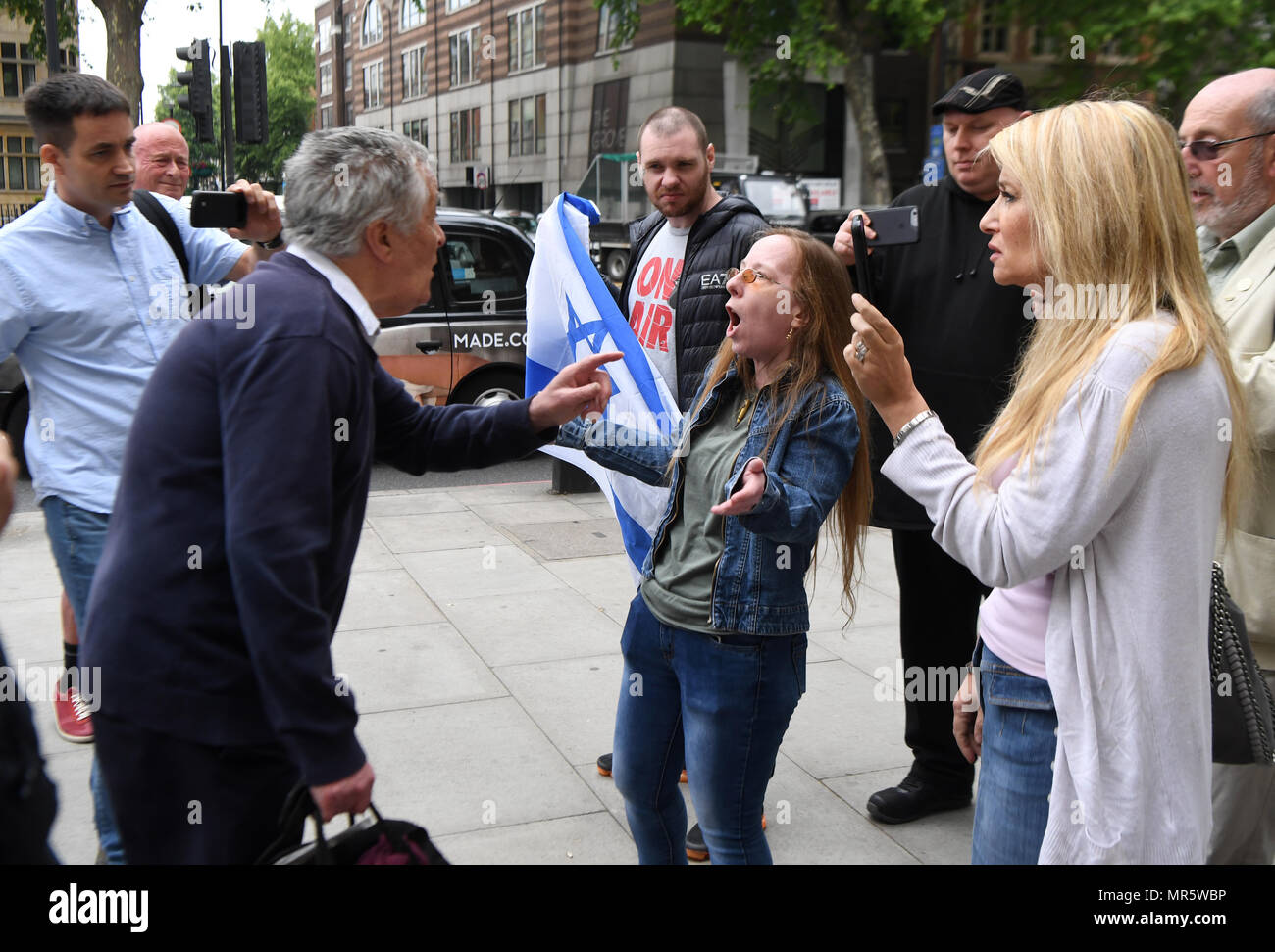 Arguments ensue outside westminster magistrates court hi-res stock ...
