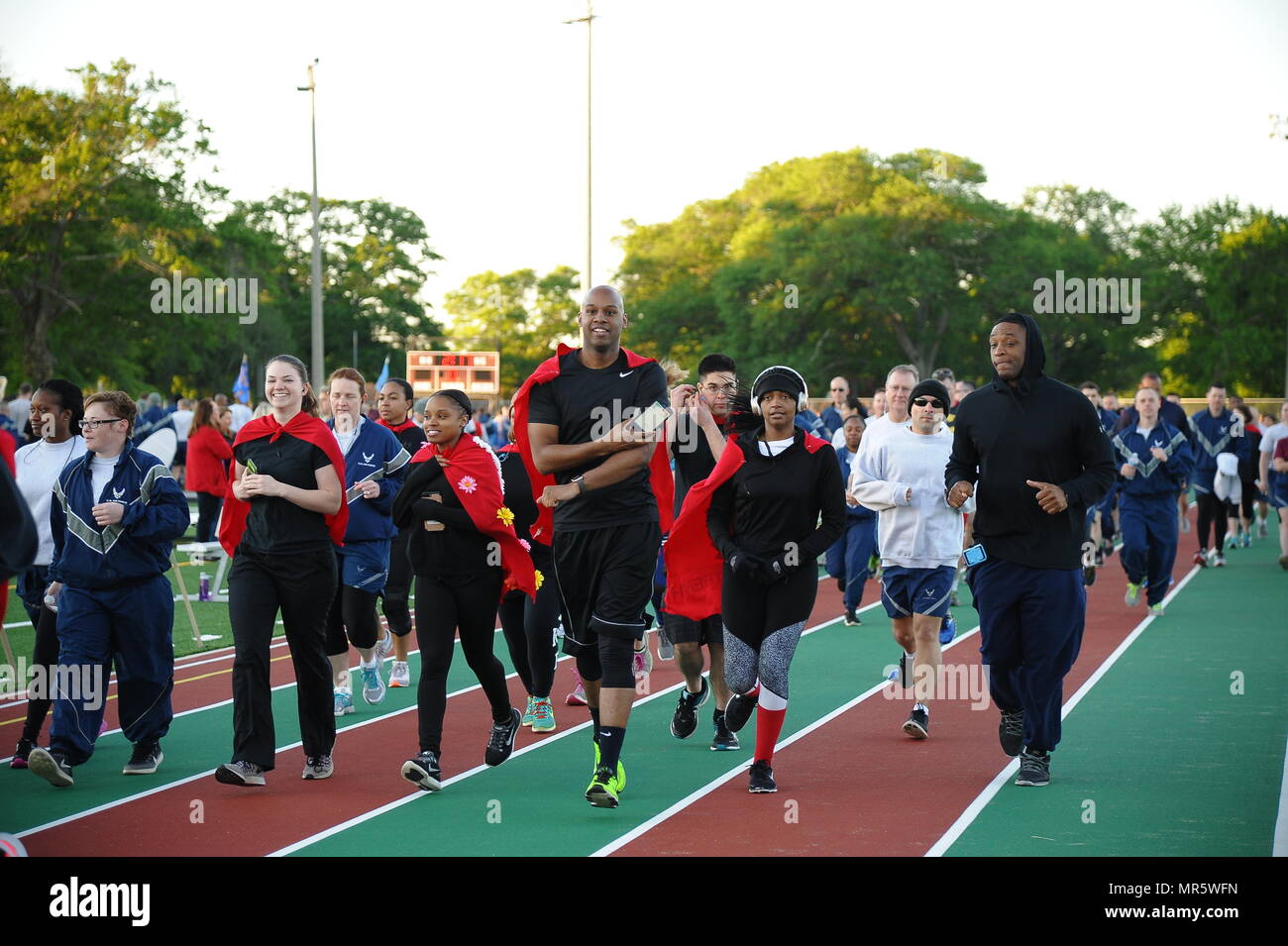 Team Robins Wingman Day kicked off with Super Hero Run at the Football ...