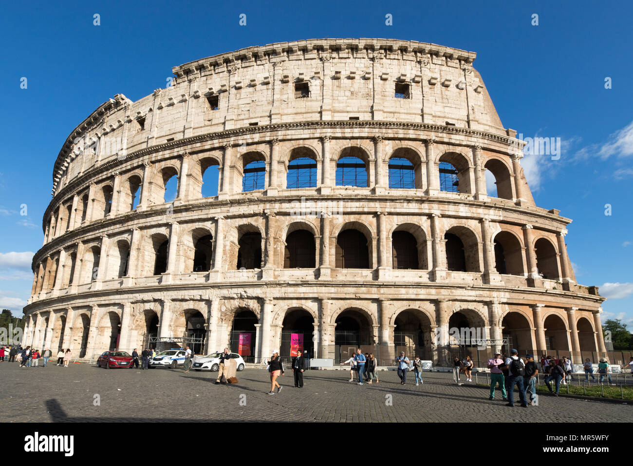 Rome Coliseum scene, tourists walking and visiting the roman ...