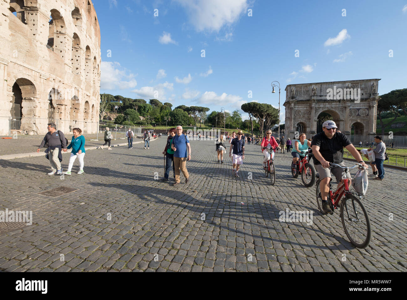 Rome Coliseum scene, tourists walking and visiting the roman ...