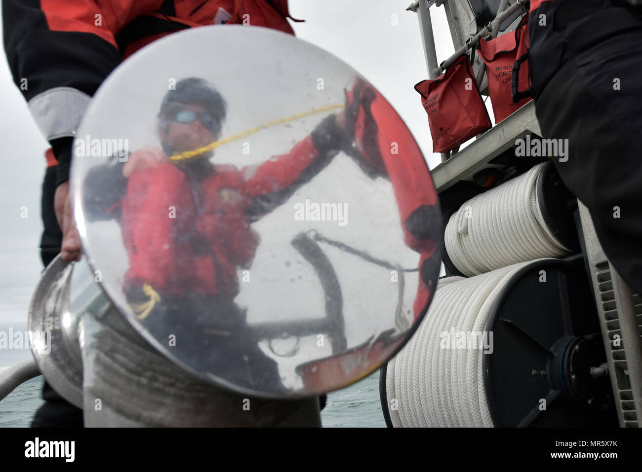 Petty Officer 2nd Class Garrett Hamilton, a boatswain's mate assigned ...