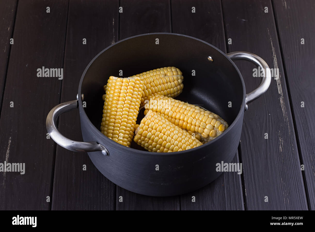 yellow gold colorful sweet maize corn boiling cooking in a large ...