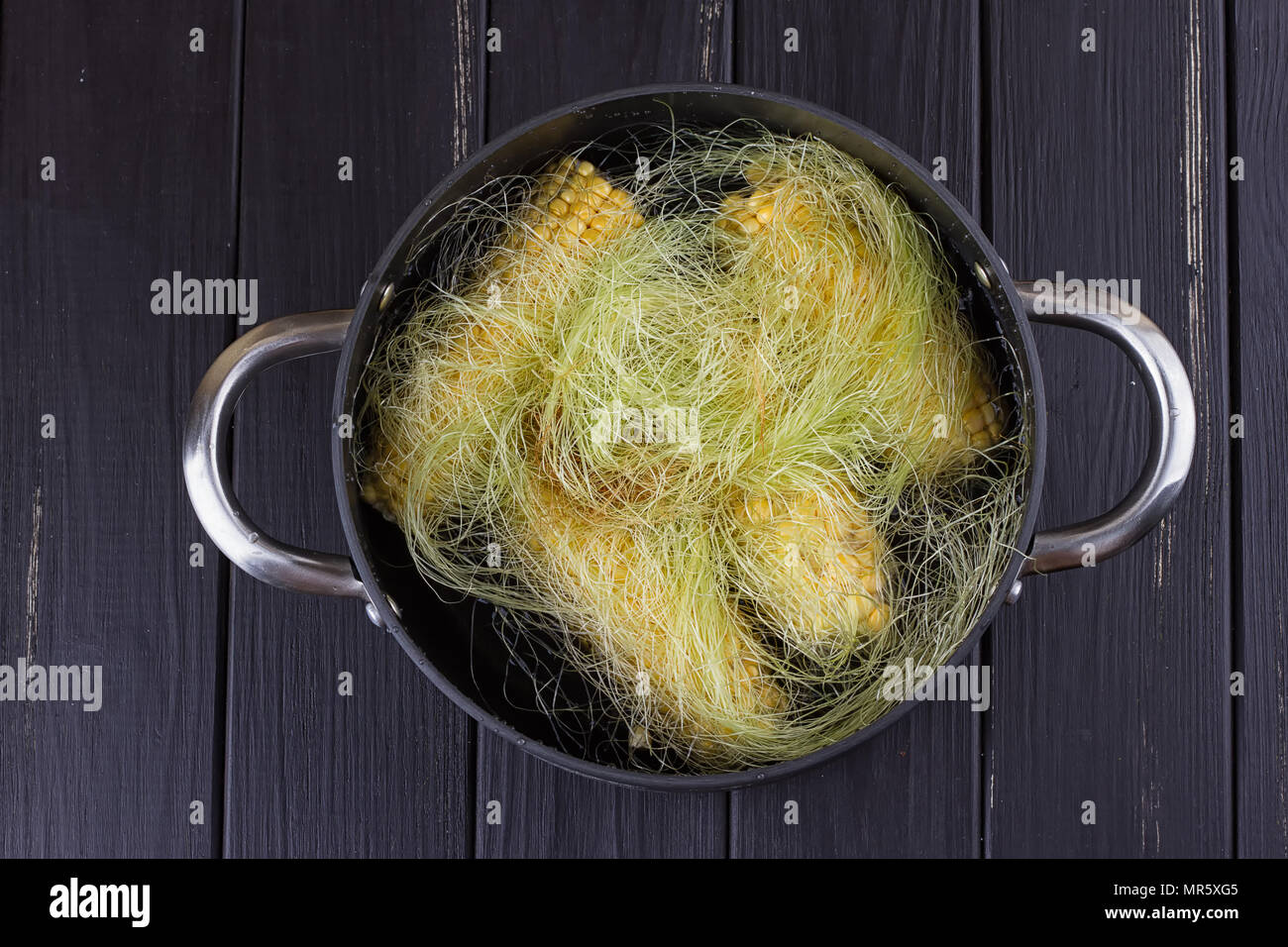 yellow gold colorful sweet maize corn boiling cooking in a large ...